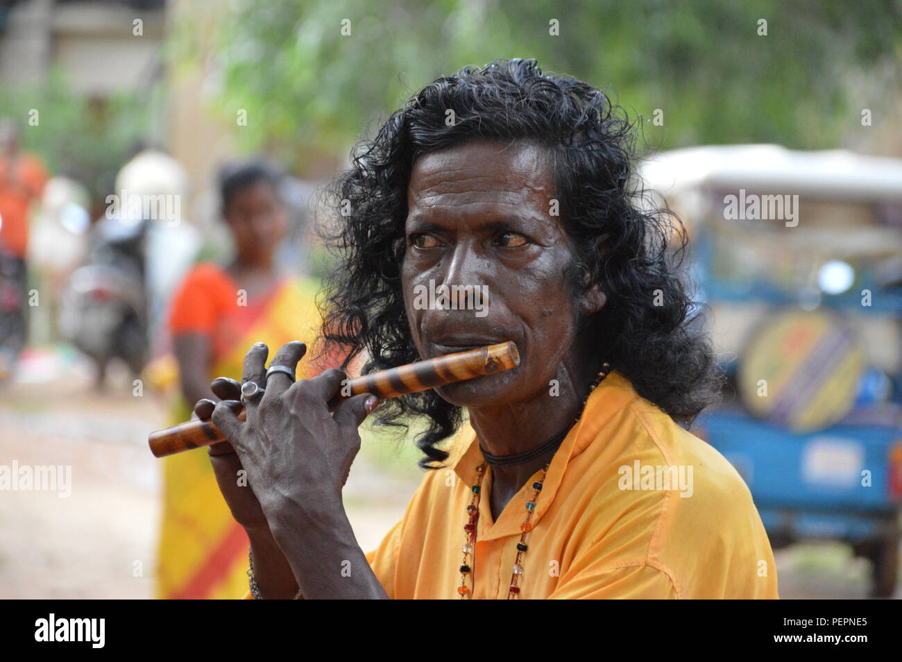 A flute player is performing at the Ananda and Tarun Khyapa Baul song ...