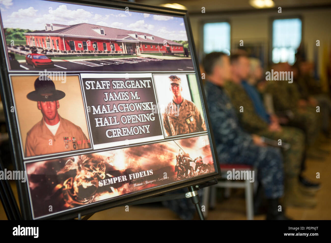A plaque stands on display during a dedication ceremony of the new ...