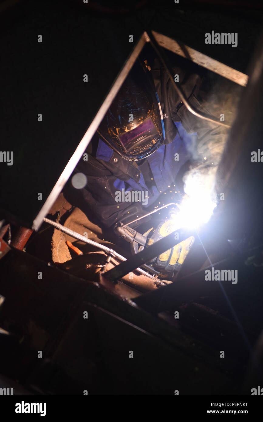Petty Officer 3rd Class Agustin Foguet, a damage controlman in the ...