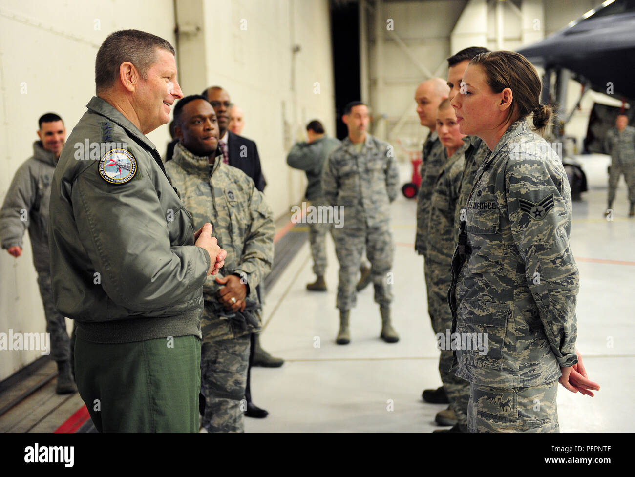 Gen. Robin Rand, AFGSC commander, speaks with Senior Airman Rebecca ...
