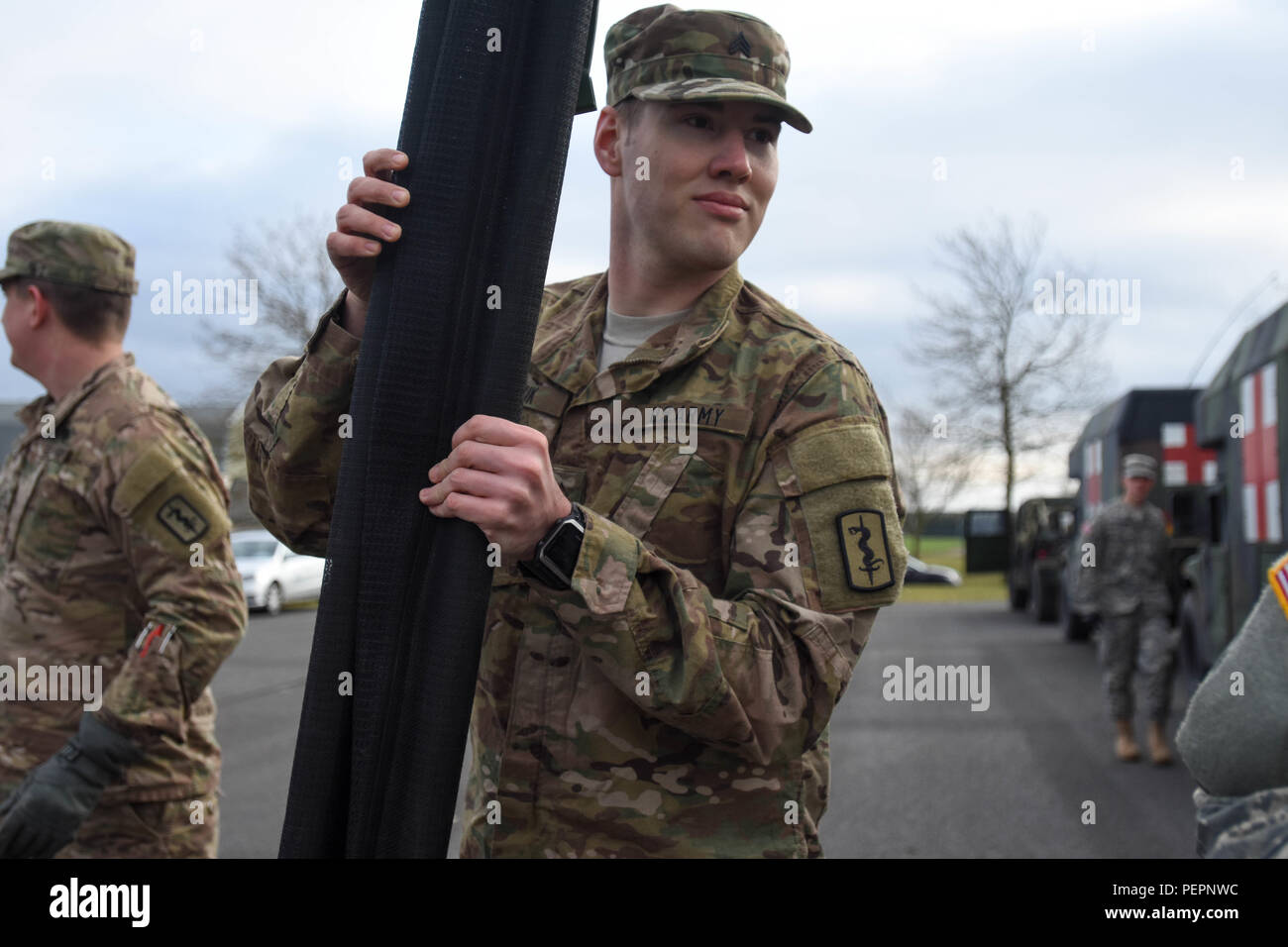 Soldiers from the 557th Area Medical Support Company, 421st ...
