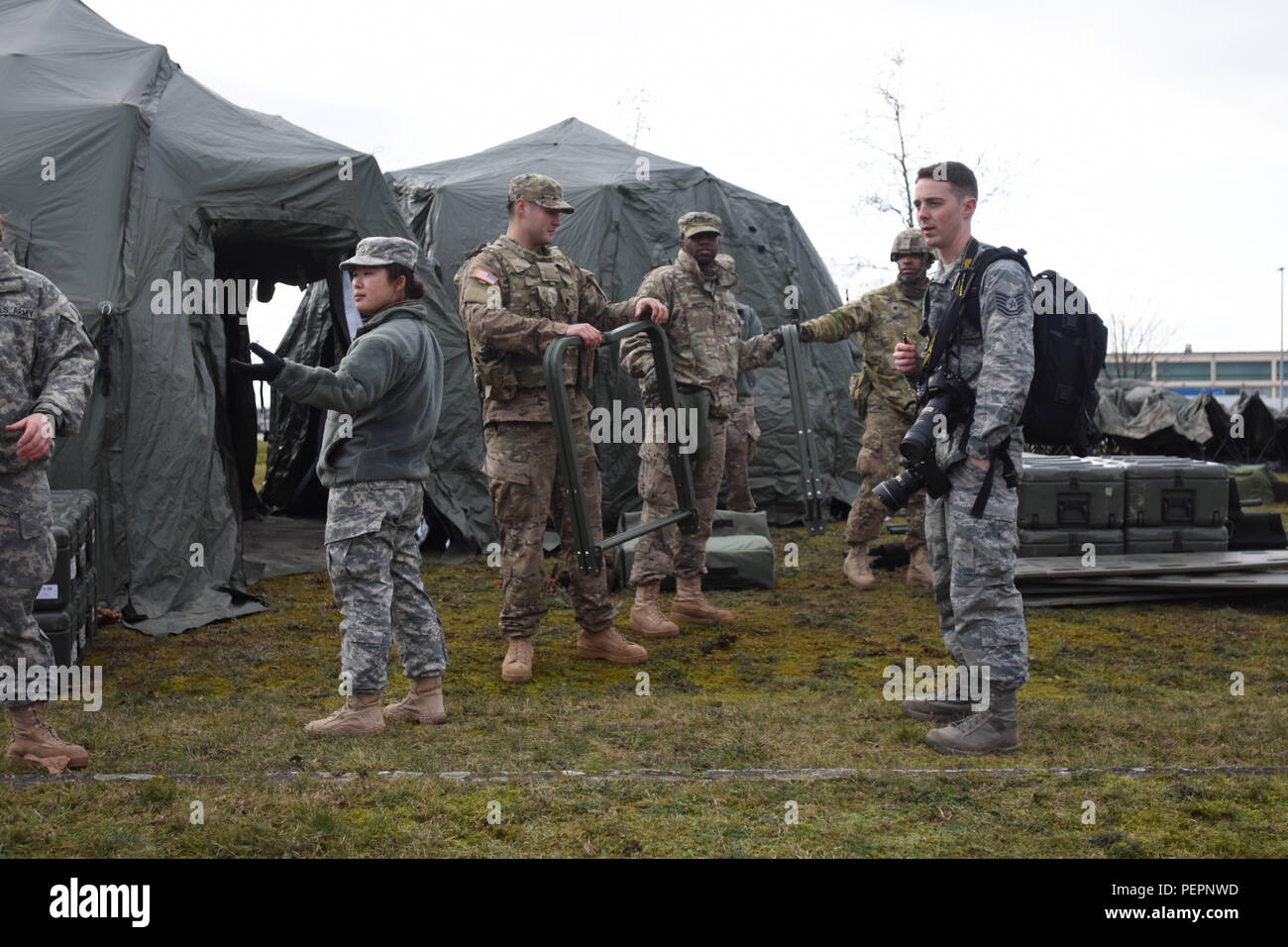 Soldiers from the 557th Area Medical Support Company, 421st ...