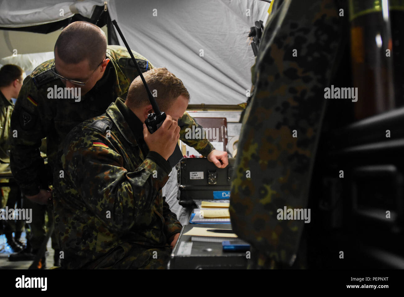 Bundeswehr medical providers at the Role 1 radio a message for medical ...