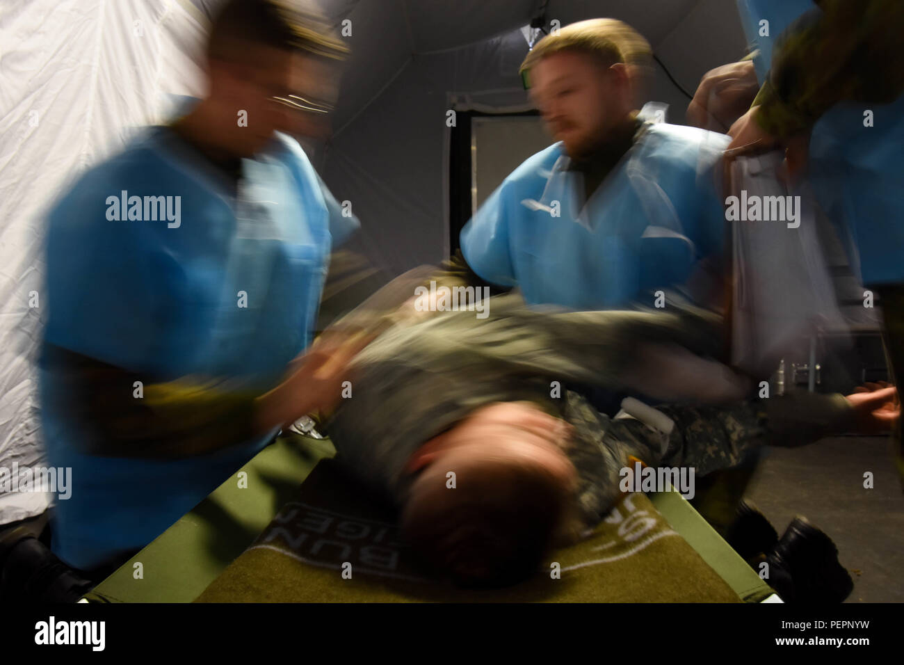 Bundeswehr medical personnel treat role player casualty Capt. Troy ...