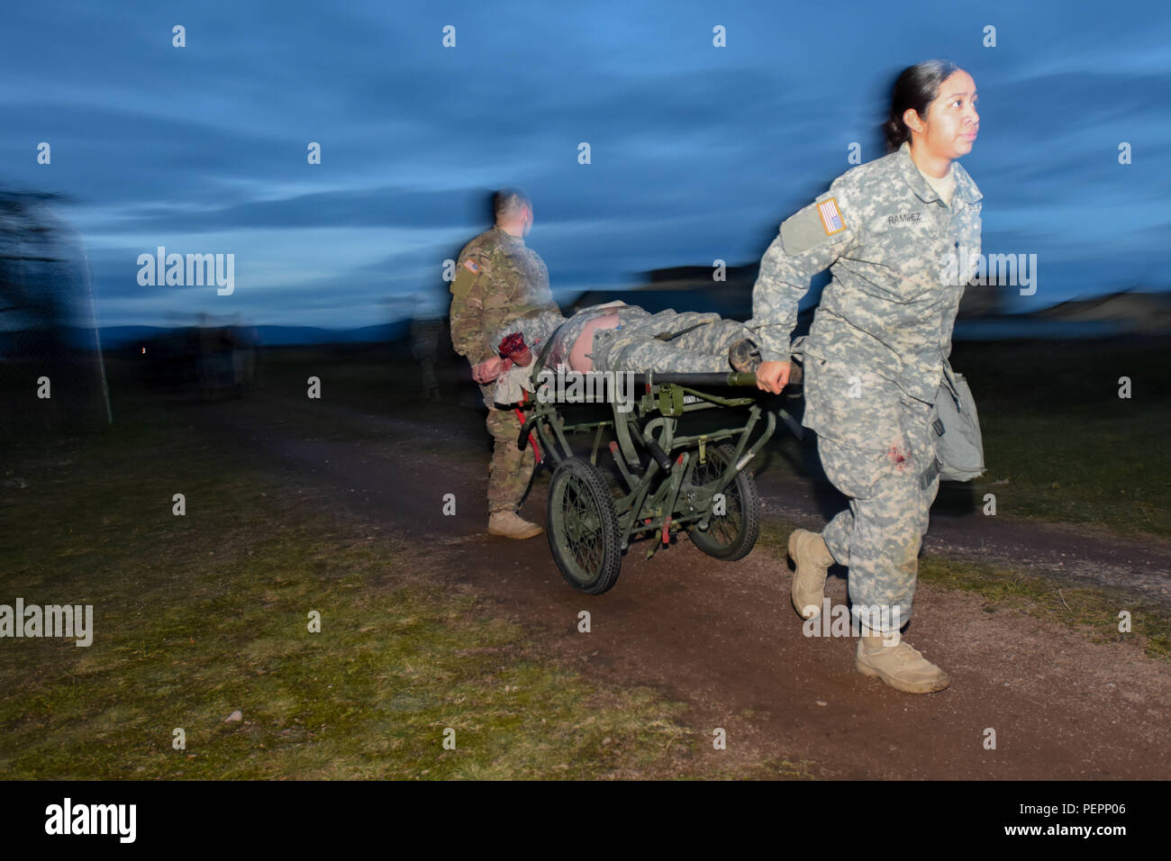 Pfc. Robert Foster (left) and Spc. Jennifer Ramirez (right), 212th ...