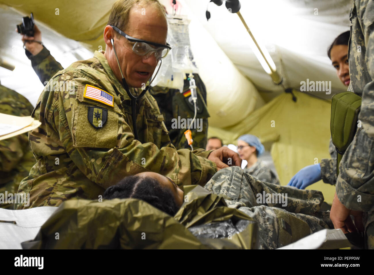 Maj. Paul Masters, 212th Combat Support Hospital nurse, assesses a role ...