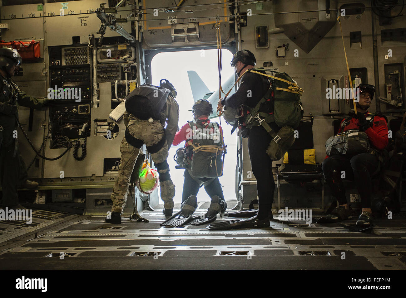 Guardian Angels from the 304th and 308th Rescue Squadrons jumped from C ...