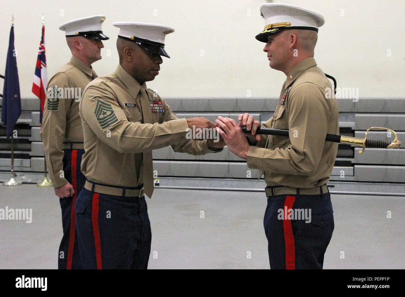 Sgt. Maj. Spencer J. Beacham (center), the outgoing senior enlisted ...