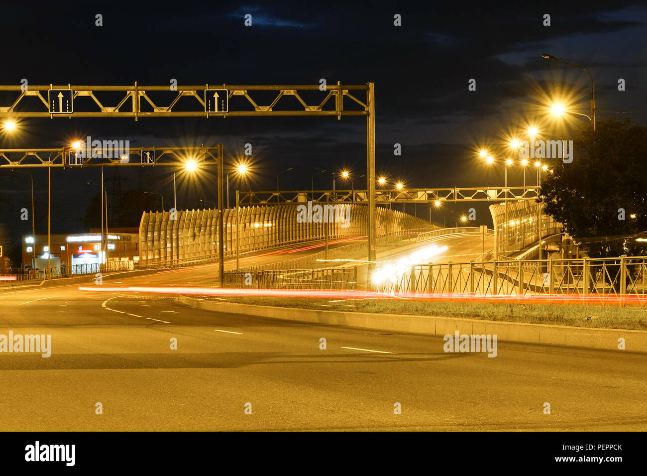 Night shooting of the road. At night the city lights up. Lighting of ...