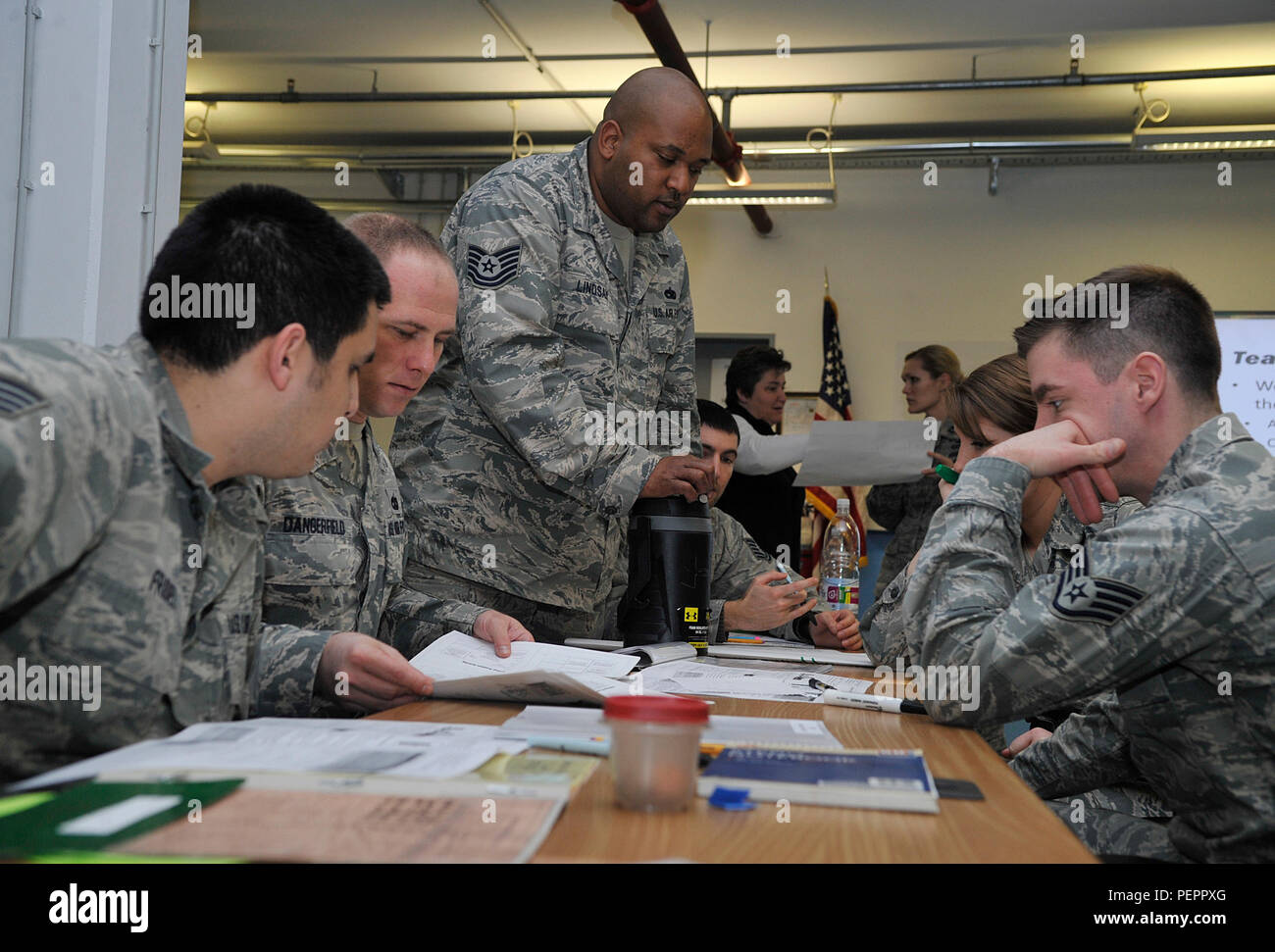 A team of Airmen work together during a Problem Identification Training ...