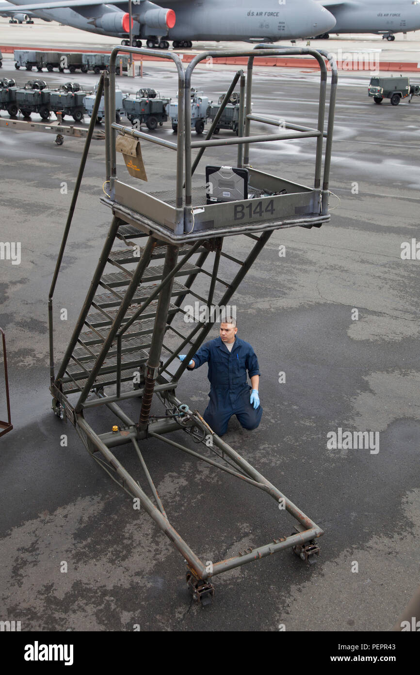 Senior Airman Bryan C. Nicks, 349th Maintenance Squadron, raises a B-1 ...