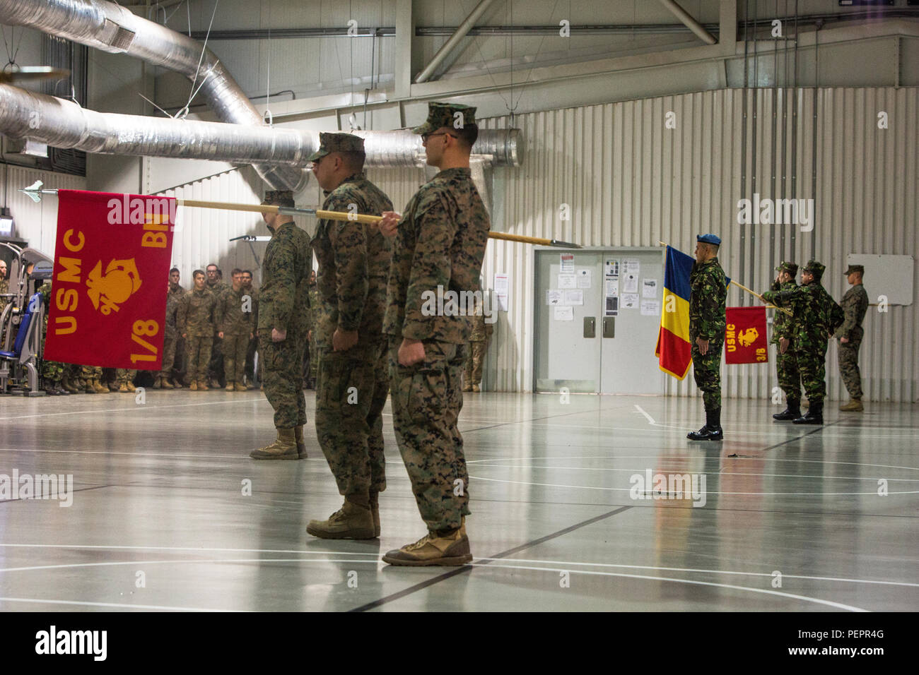 Romanian Armed Forces stand with U.S. Marines during the transfer-of ...
