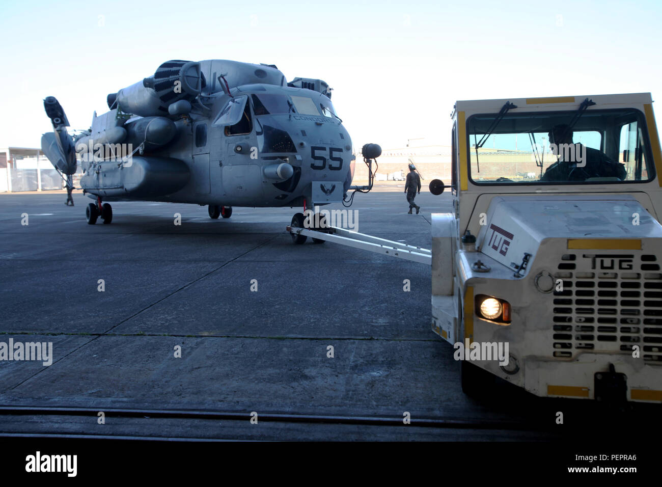 Cpl. Conner Tucker tows a CH-53E Super Stallion during aircraft ...