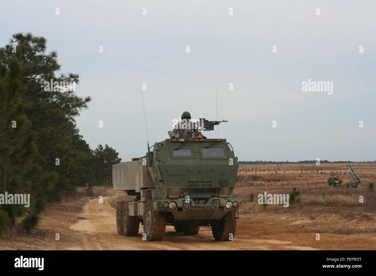 A Soldier assigned to Able Battery, 321st Field Artillery Regiment ...