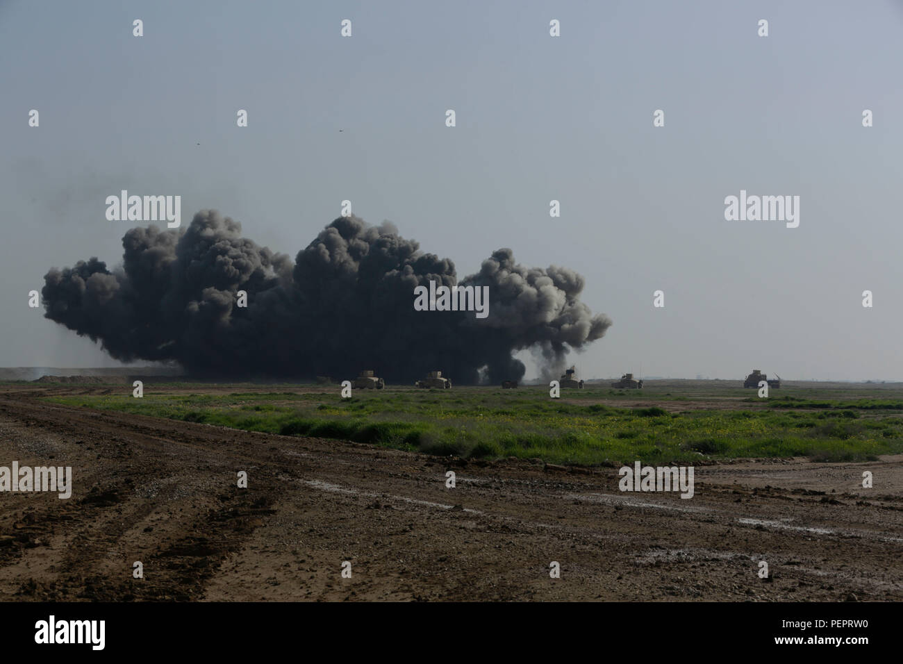 An M58 Mine Clearing Line Charge (MCLC), fired by Iraqi soldiers with ...