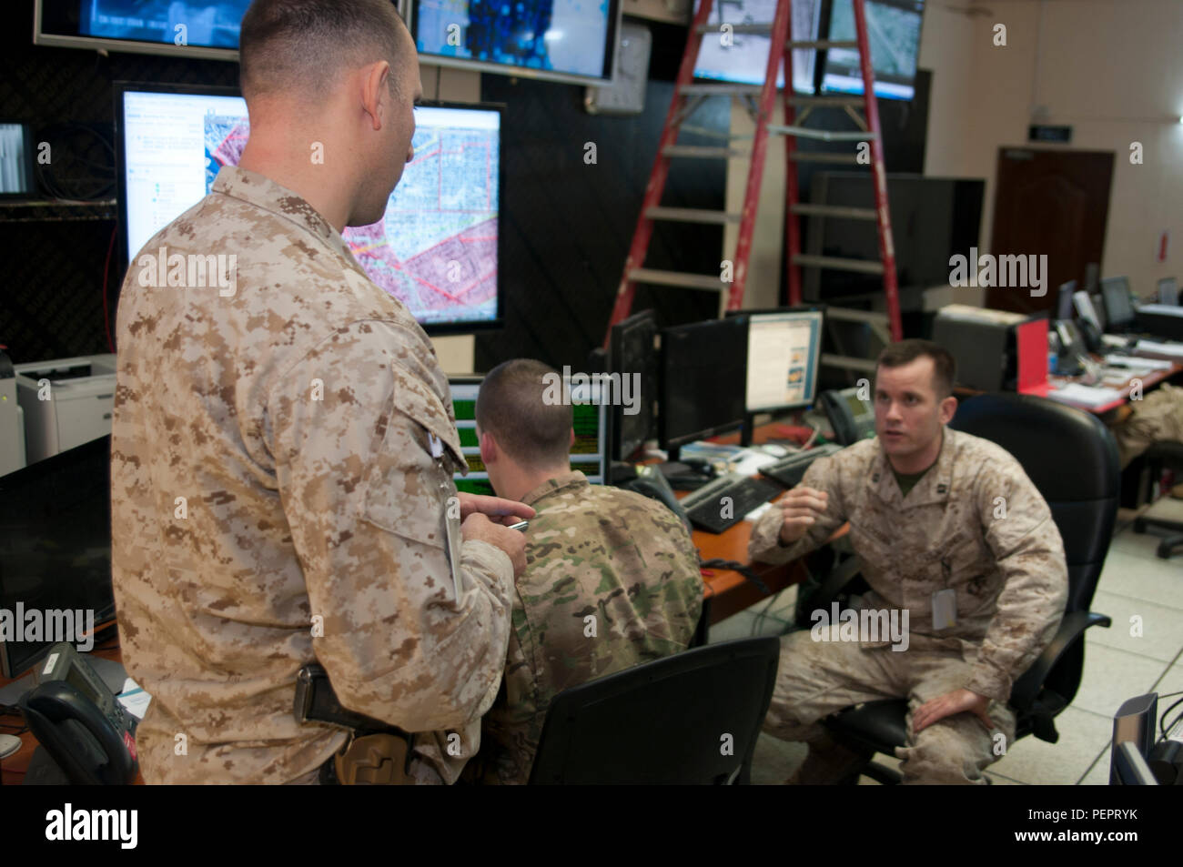 U.S. Marine Corps Lt. Col. Jeff McCormack, left, the deputy Coalition ...