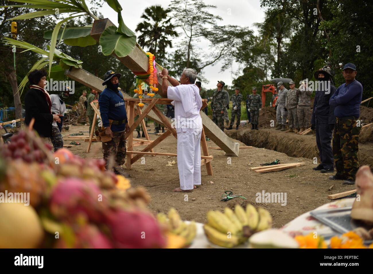 Samai Tanapai Bul blesses a pillar at the Wuat Ban Mak school, during ...