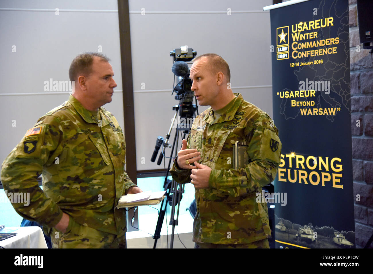 Lt. Gen. Ben Hodges, U.S. Army Europe commanding general (left) listens ...