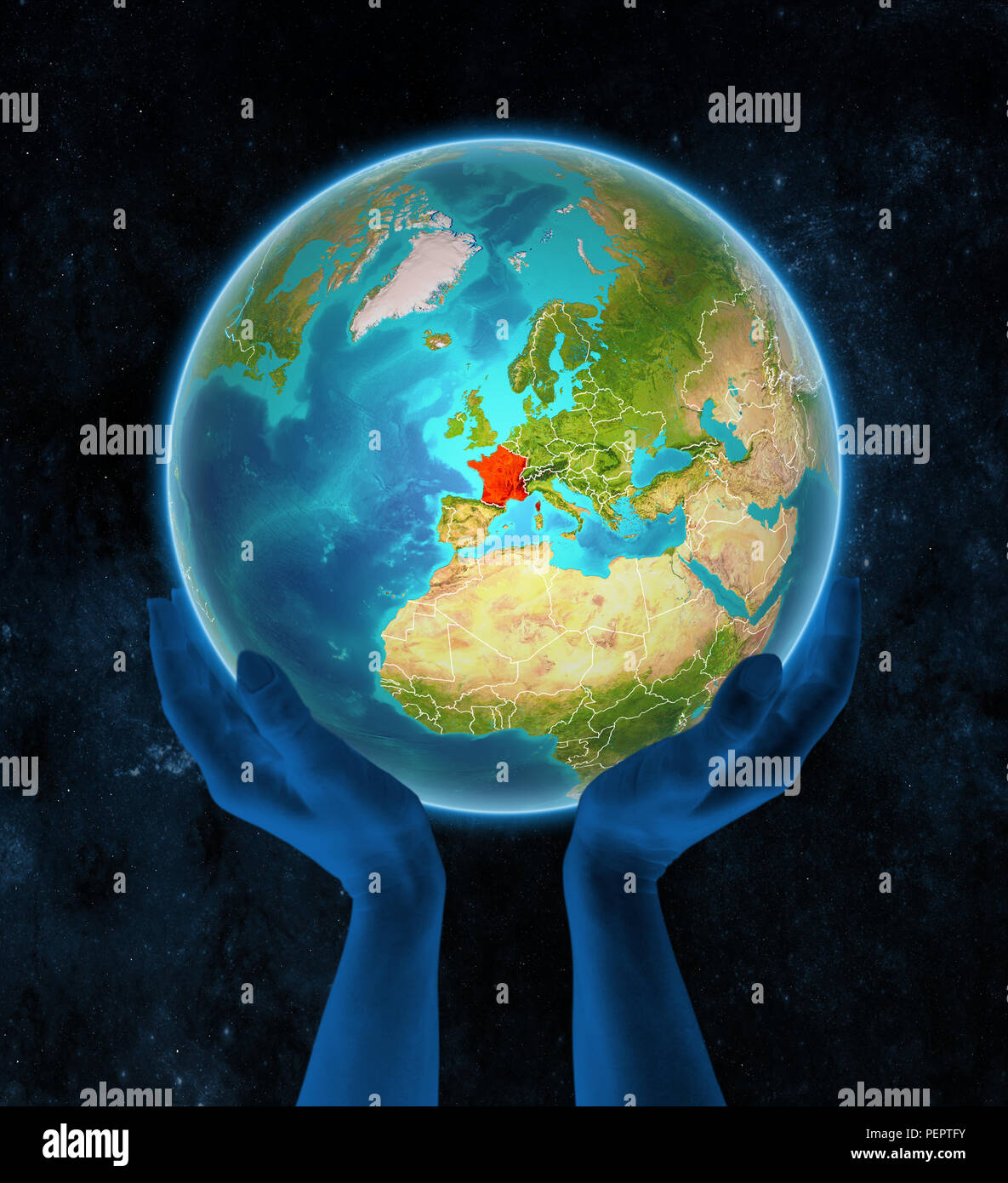 France on planet Earth with visible country borders in hands in space ...