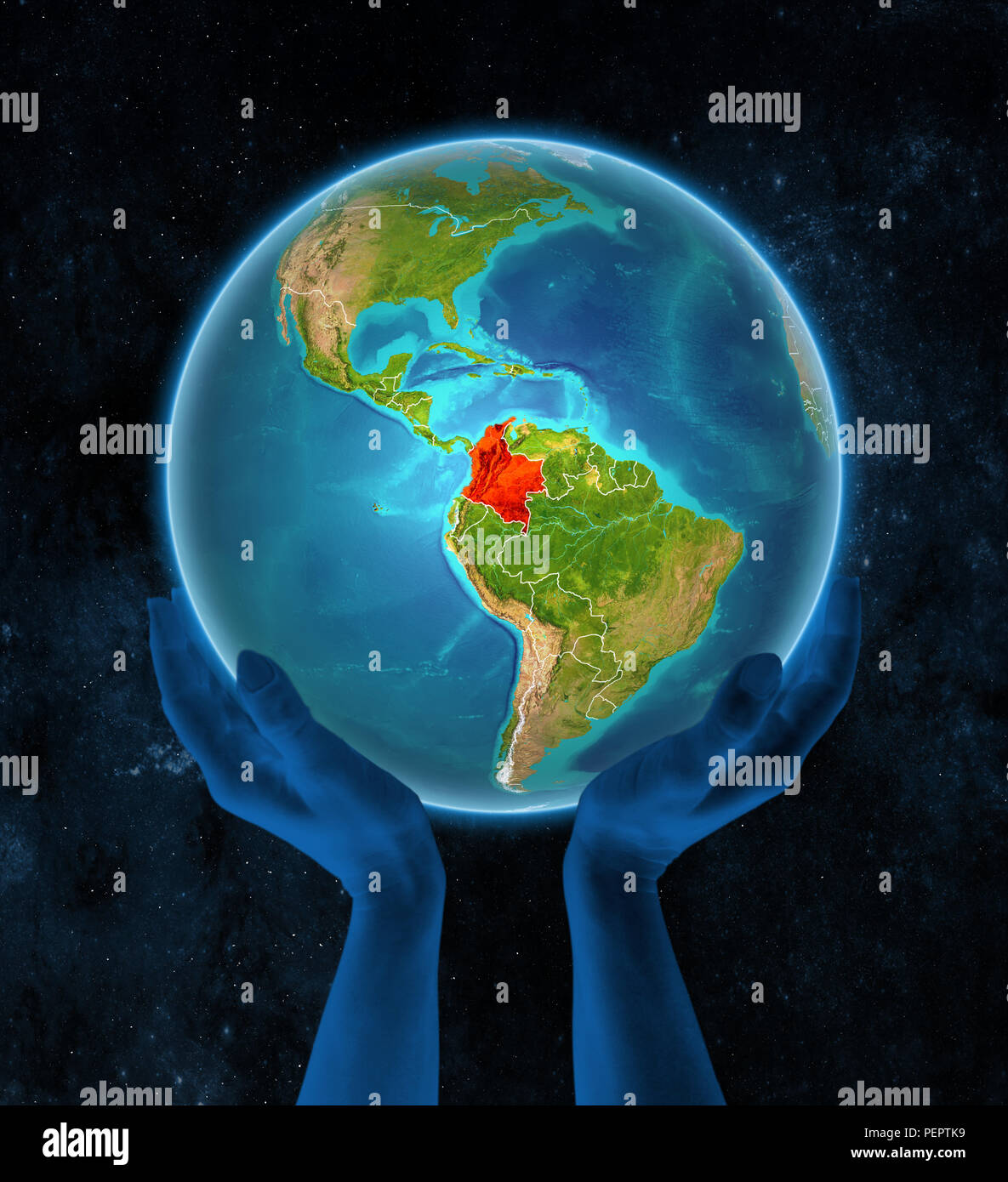 Colombia on planet Earth with visible country borders in hands in space ...