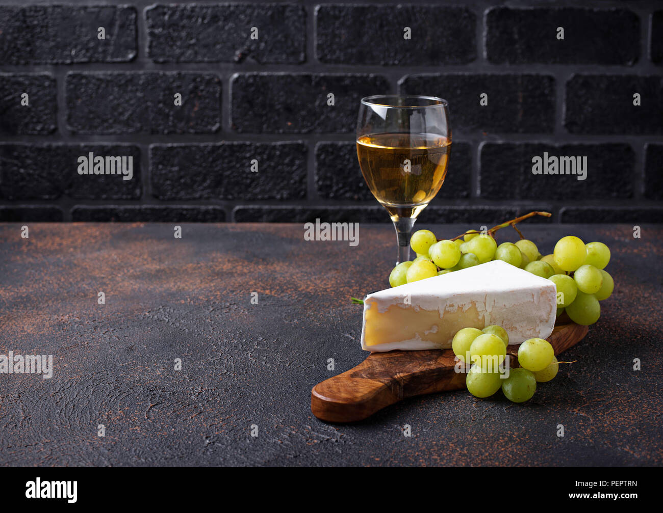 Cheese brie, grape and wine Stock Photo - Alamy