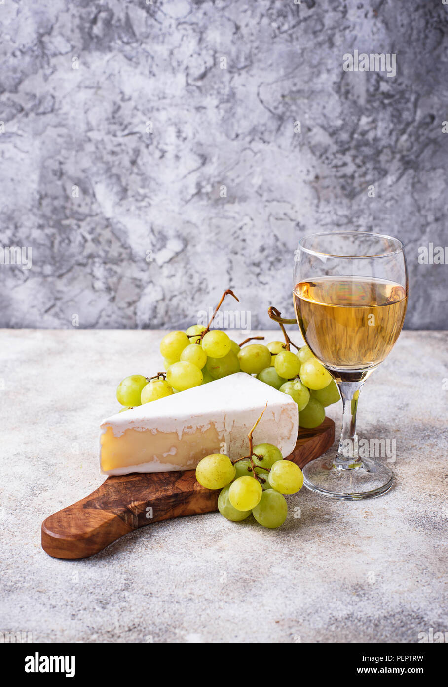 Cheese brie, grape and wine Stock Photo - Alamy