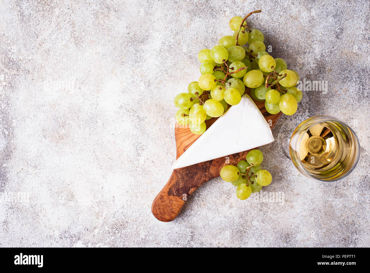 Cheese brie, grape and wine Stock Photo - Alamy