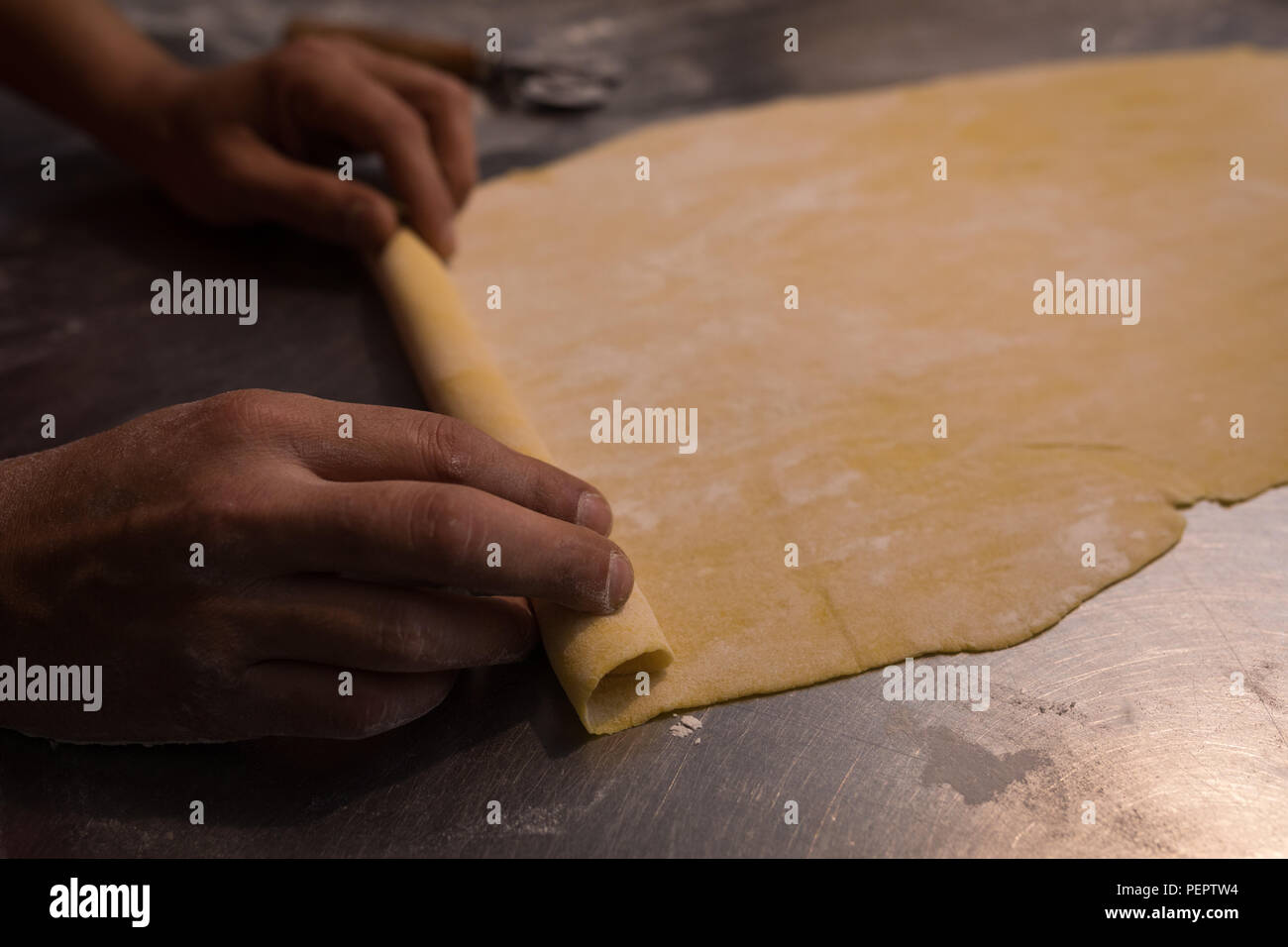 Folding dough hi-res stock photography and images - Alamy