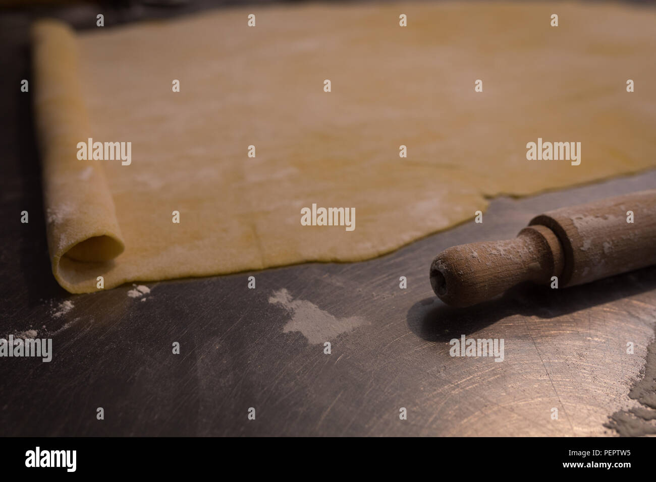 Rolled pasta on counter Stock Photo - Alamy