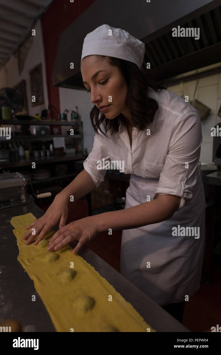 Female baker holding dough in hi-res stock photography and images - Alamy