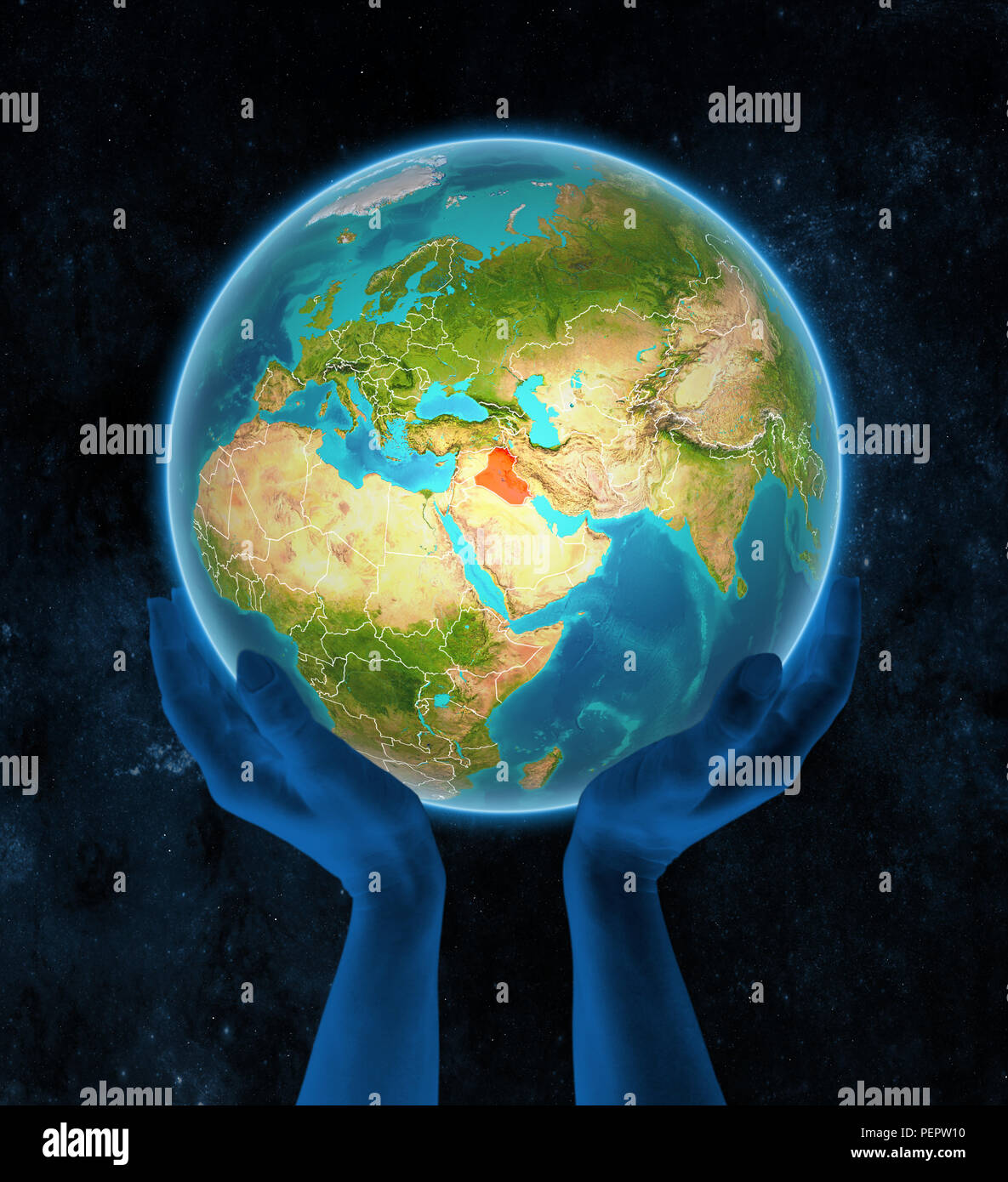 Iraq on planet Earth with visible country borders in hands in space. 3D ...