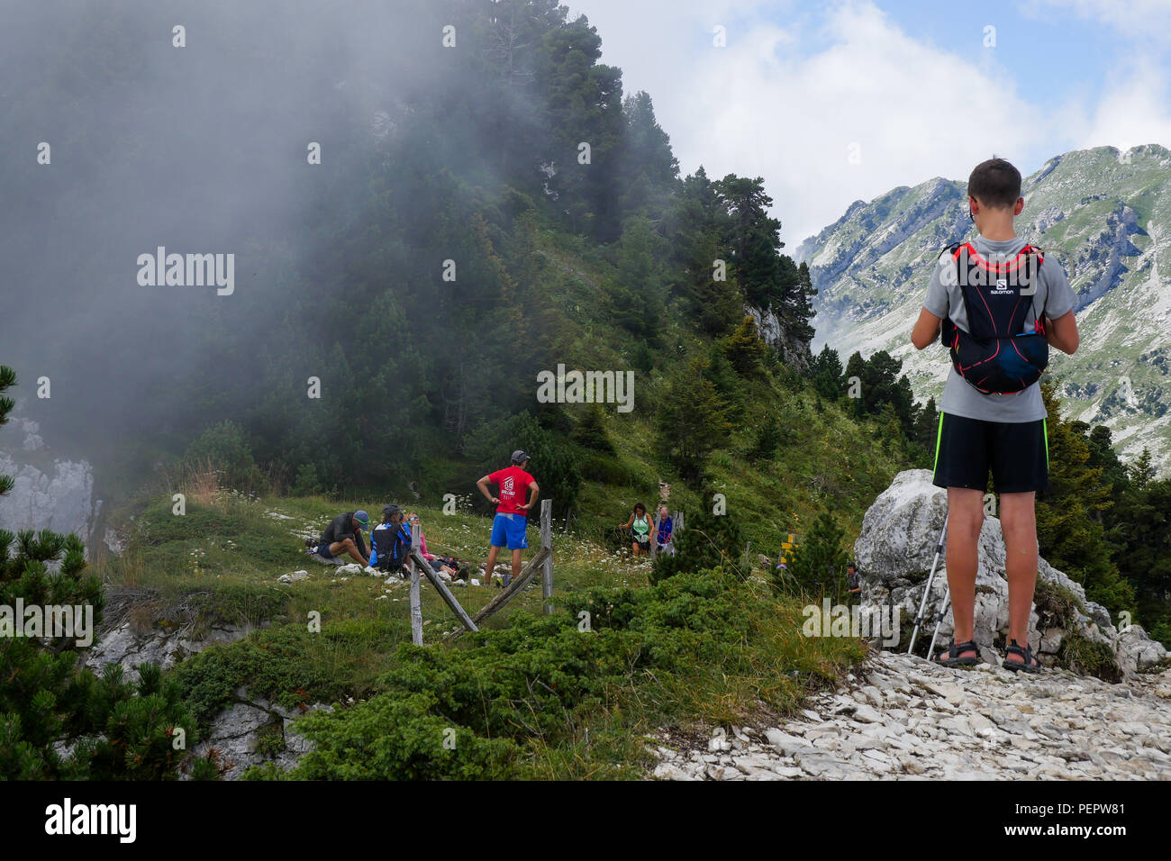 Mountain hikers at the top of the Pas de l'Aulp du Seuil (1926 meters ...