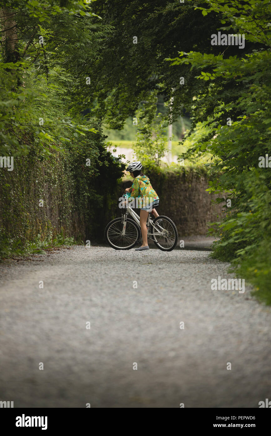 Girl riding bicycle hi-res stock photography and images - Alamy