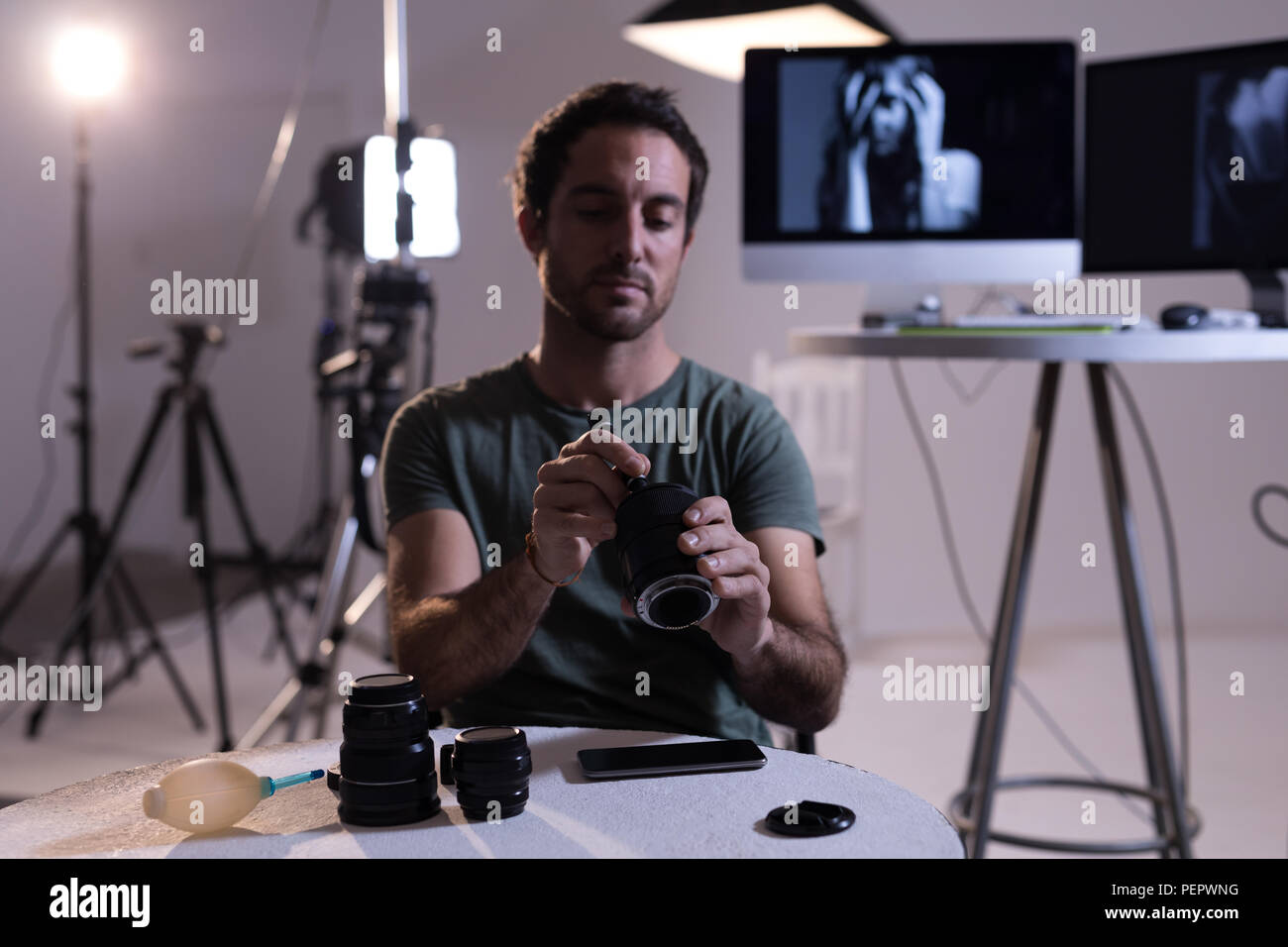 Man cleaning lens digital hi-res stock photography and images - Alamy