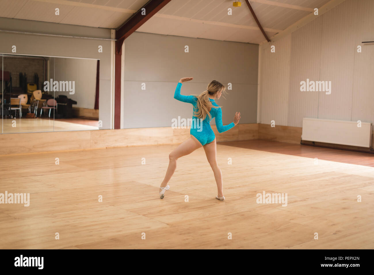 Ballerina practicing ballet dance Stock Photo - Alamy
