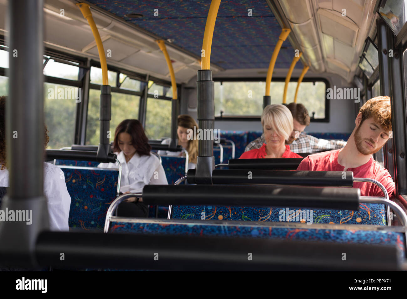 Commuters travelling in bus Stock Photo - Alamy