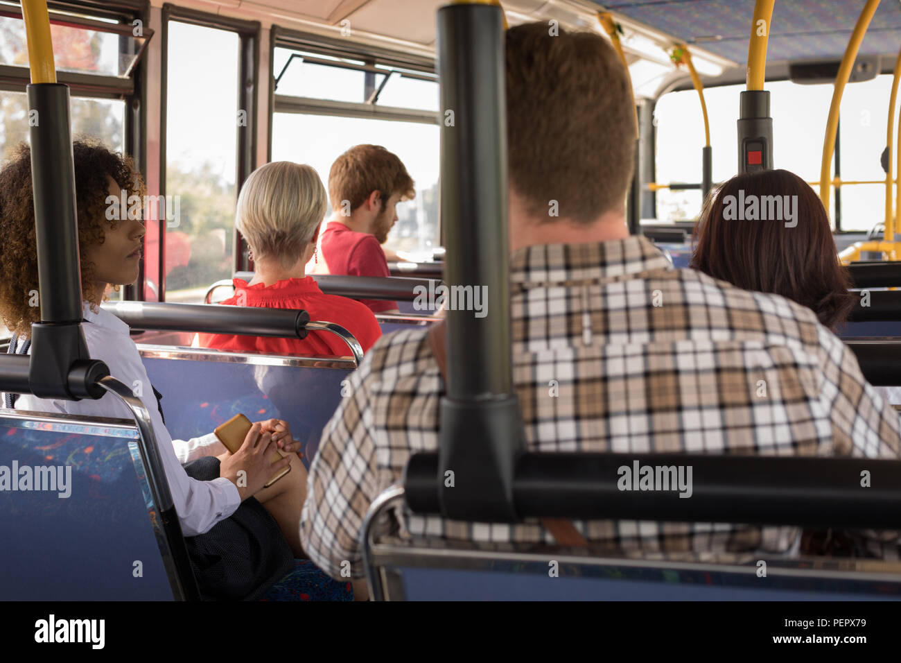 Commuters travelling in bus Stock Photo - Alamy