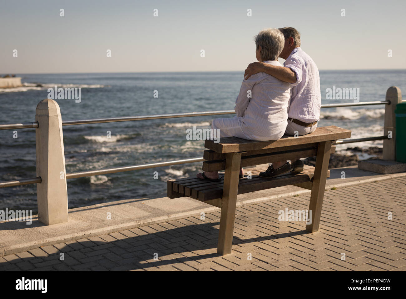 Couple sitting side side on hi-res stock photography and images - Alamy Couple sitting side side on hi-res stock photography and images - Alamy