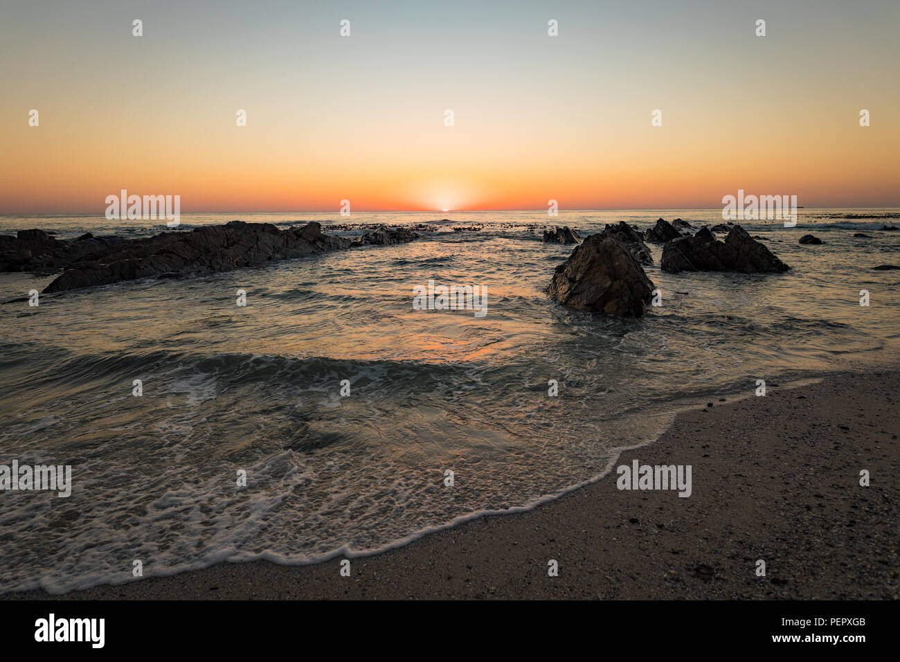 View of sunset at sea Stock Photo - Alamy