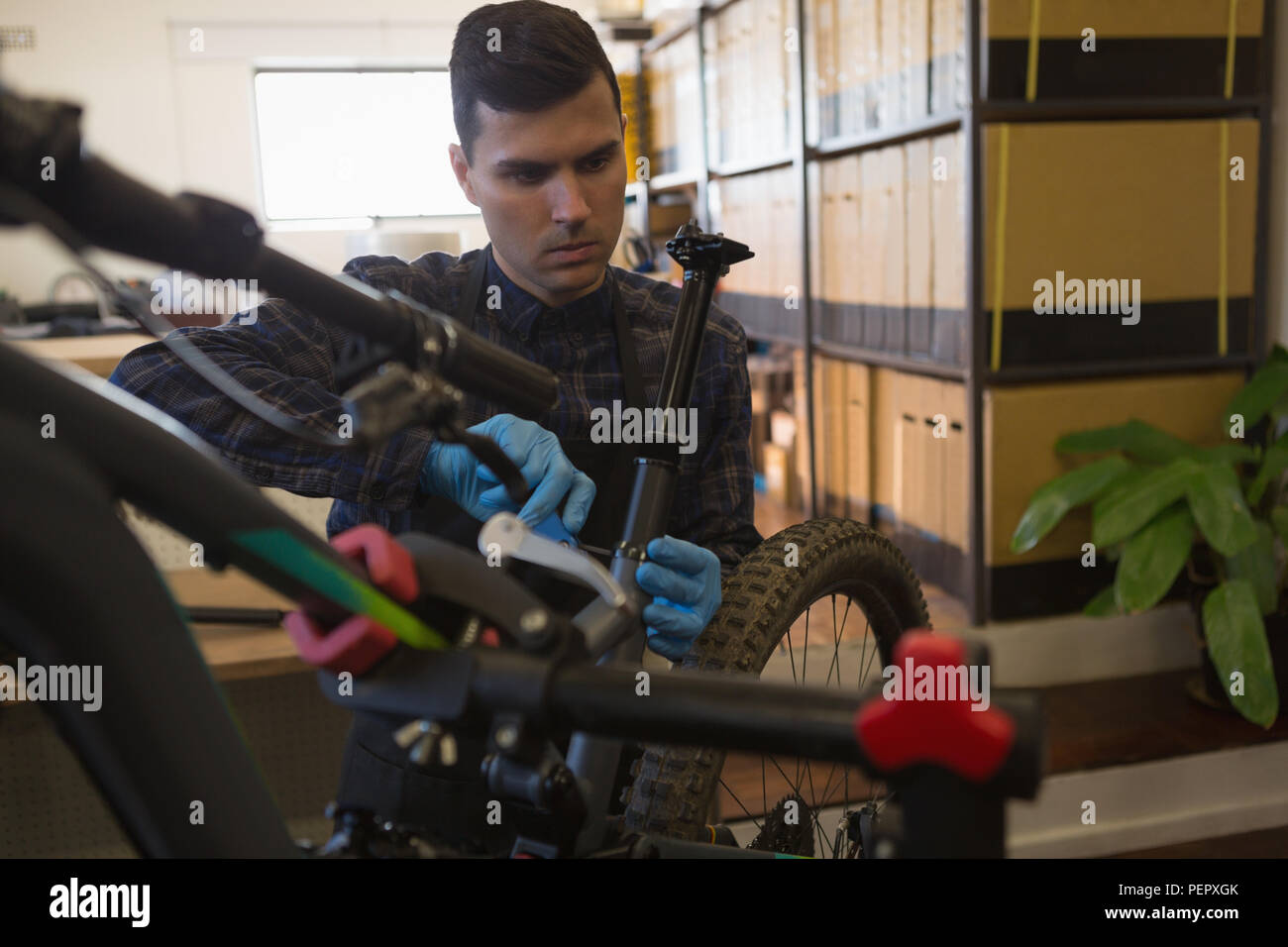 Repairing bicycle hi-res stock photography and images - Alamy