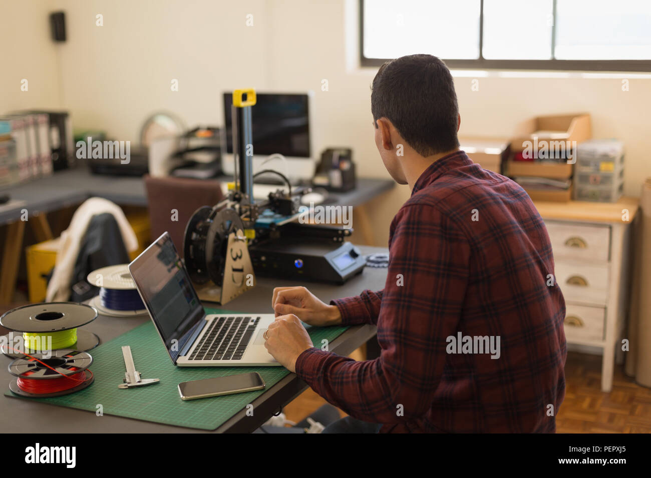 Mechanic using die machine on hi-res stock photography and images - Alamy