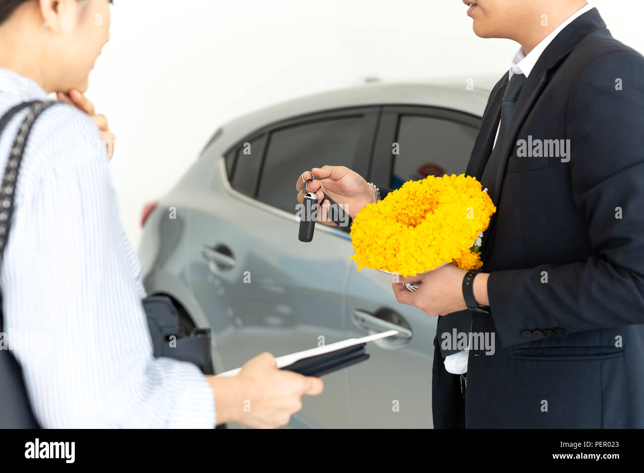 Handing car keys hi-res stock photography and images - Alamy