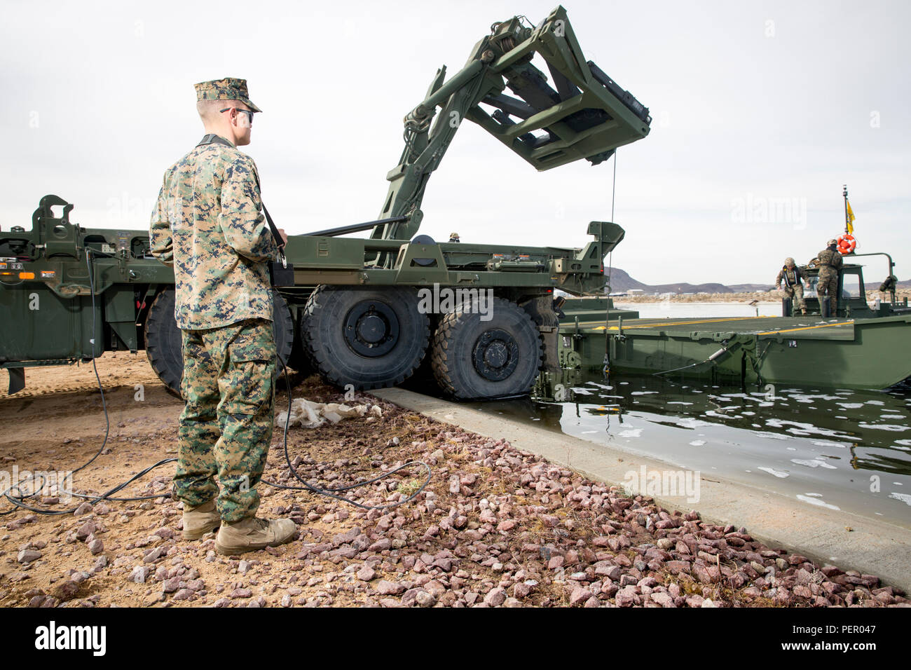 Marines from 7th ESB test an improved ribbon bridge section at the ...