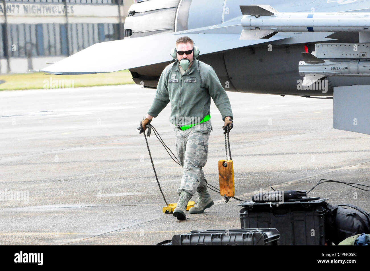 The 113th Wing crew chief Staff Sgt. Samuel Baughman prepares an F-16C ...