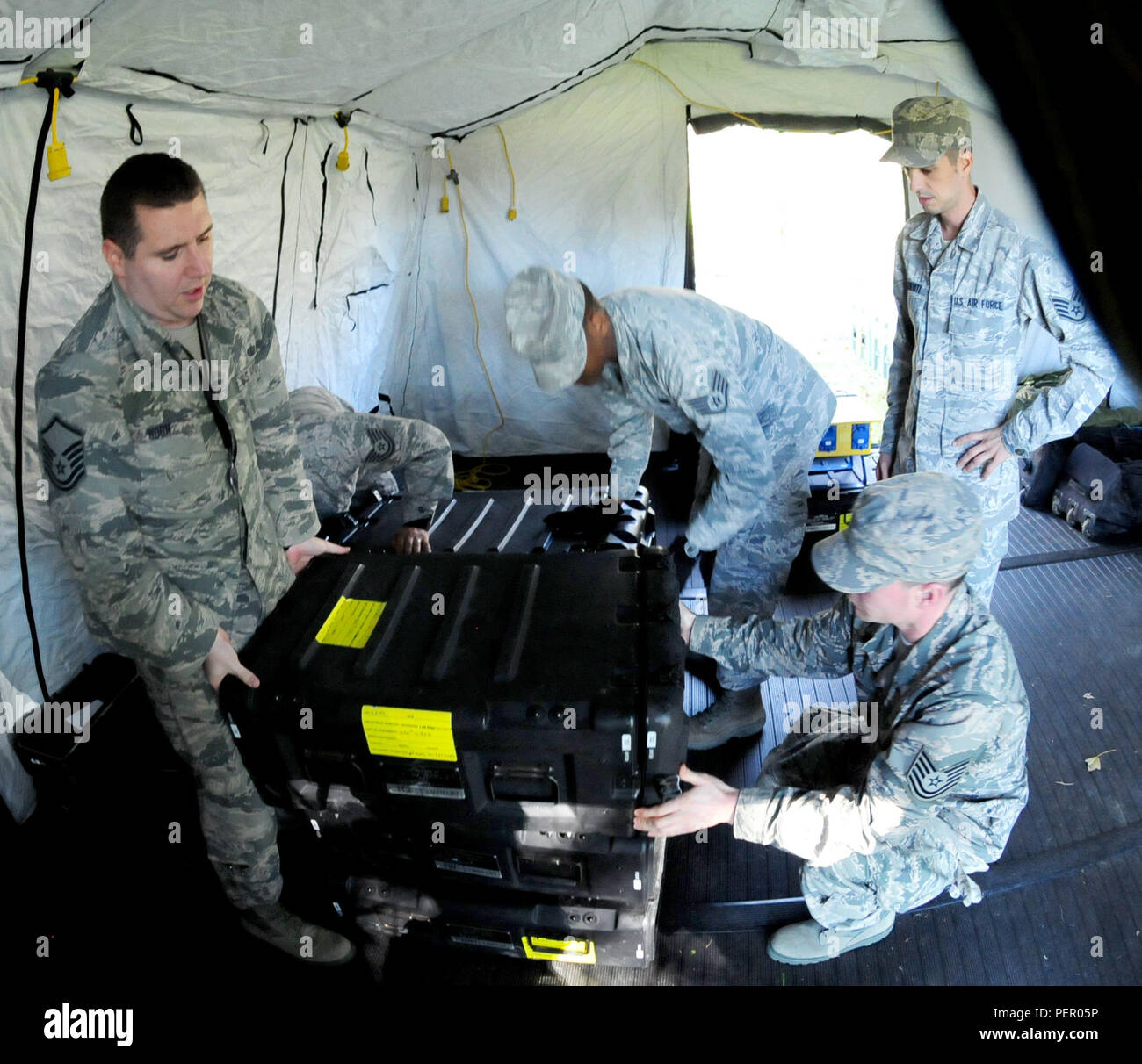 Members of the 113th Communications Flight connect communications ...