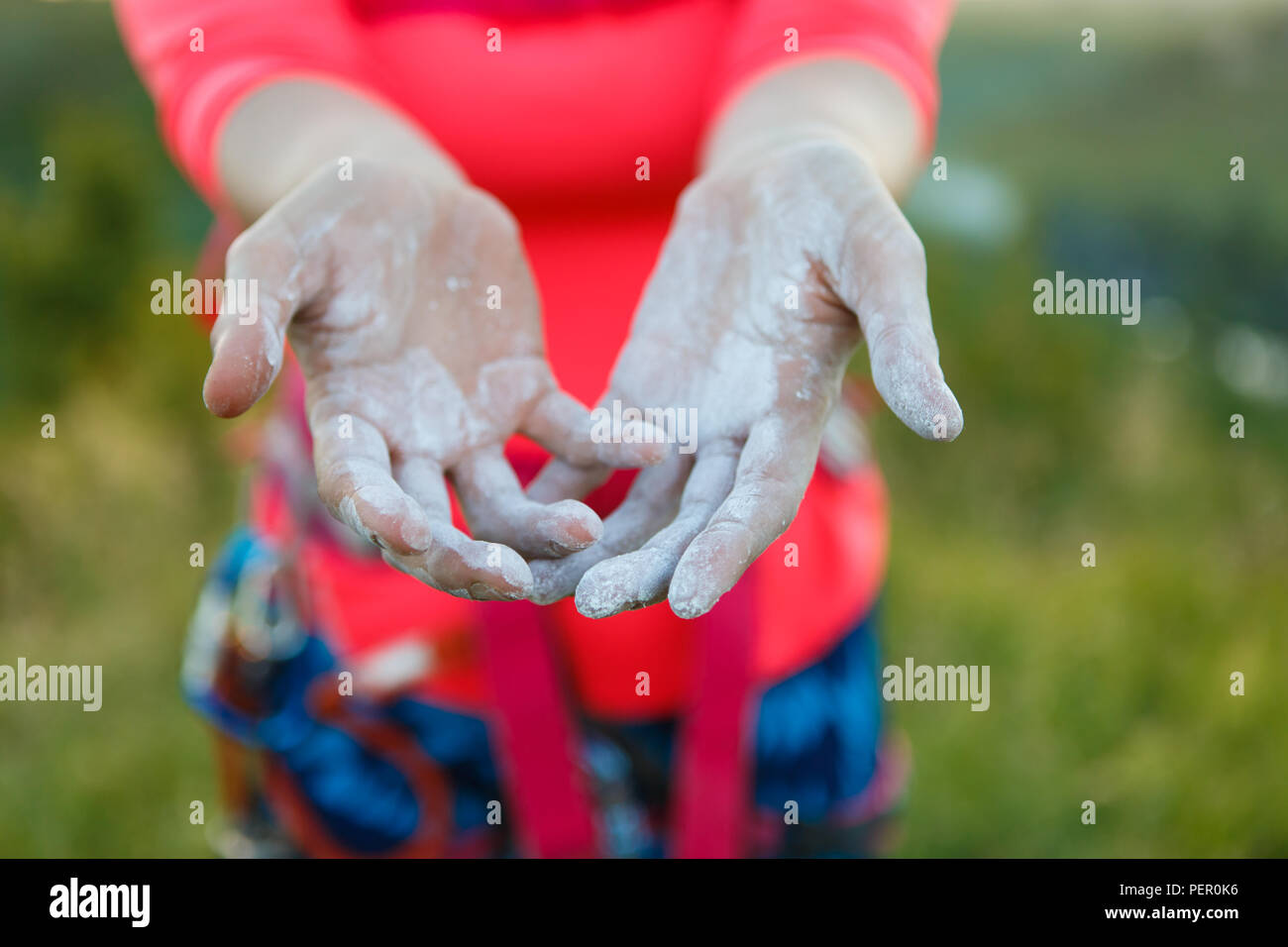 Picture of woman climber with talc on hands Stock Photo - Alamy