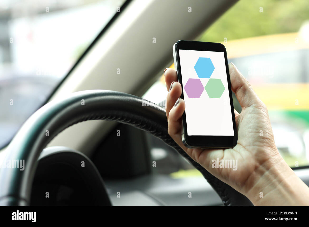 Women driving and texting car hi-res stock photography and images - Alamy