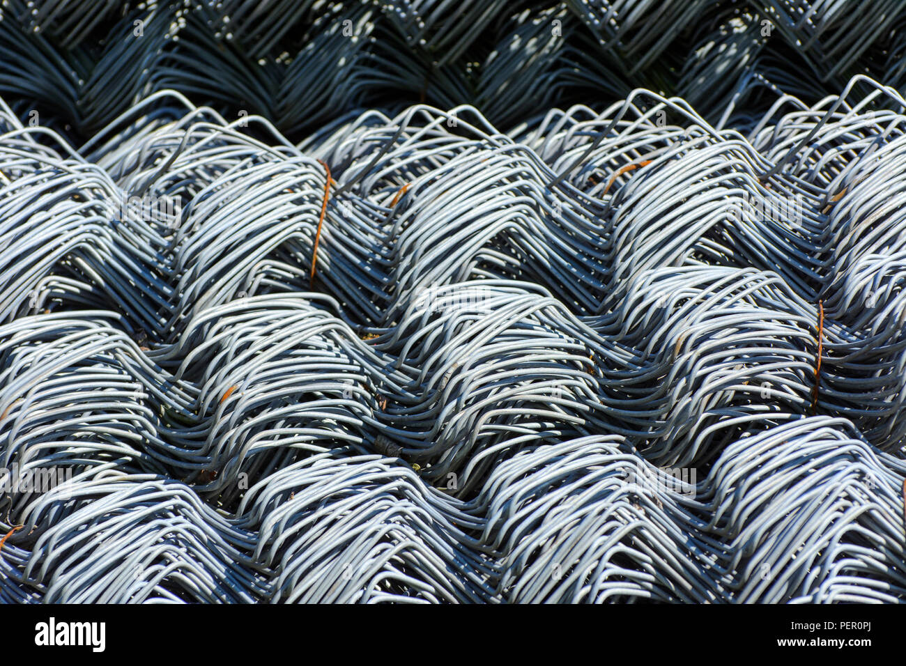 Rolls of galvanized steel wire mesh with a large cell and twisted ...