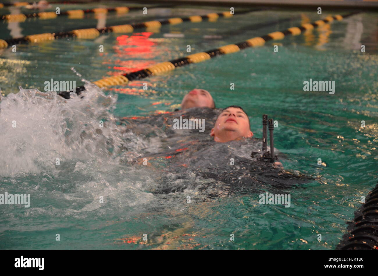 Soldiers from HHB, 18th Field Artillery Brigade, carry each other down ...