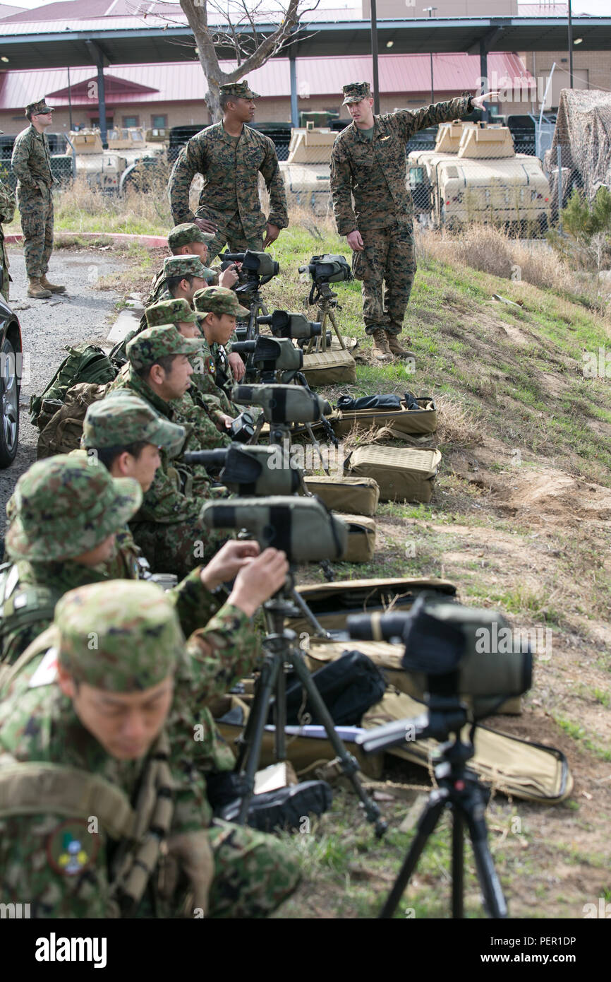 Staff Sgt. Mark Pins, right, a reconnaissance man with 1st ...